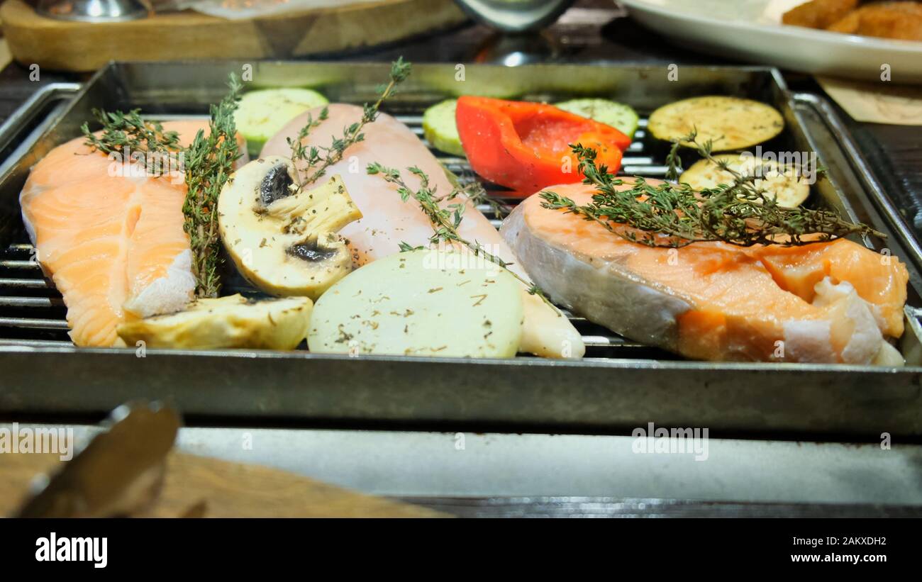 Grilled fish, grilled salmon steak, chicken, aromatic spices and ...