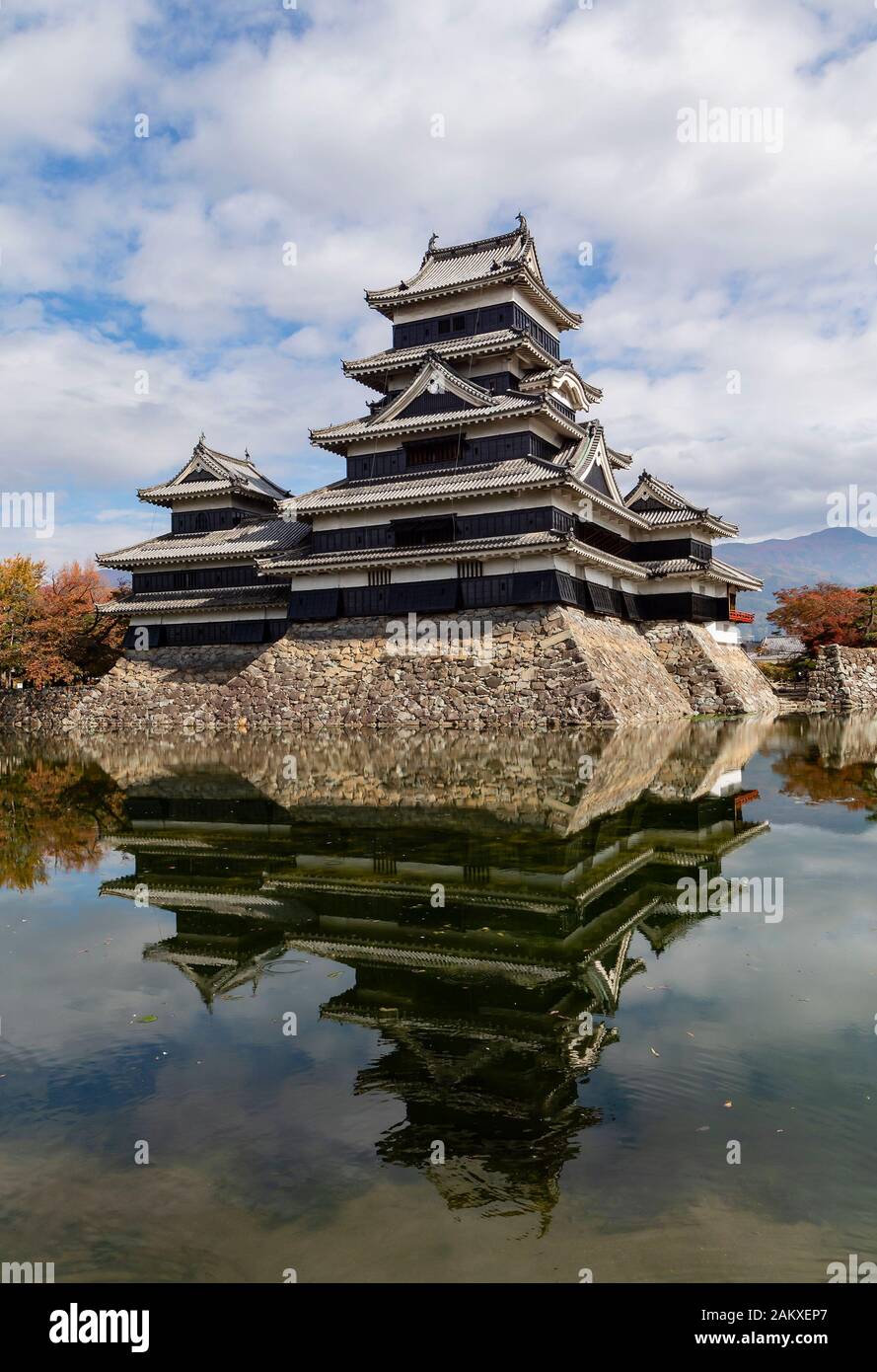 Japanese castle matsumoto with reflection in the moat hi-res stock ...