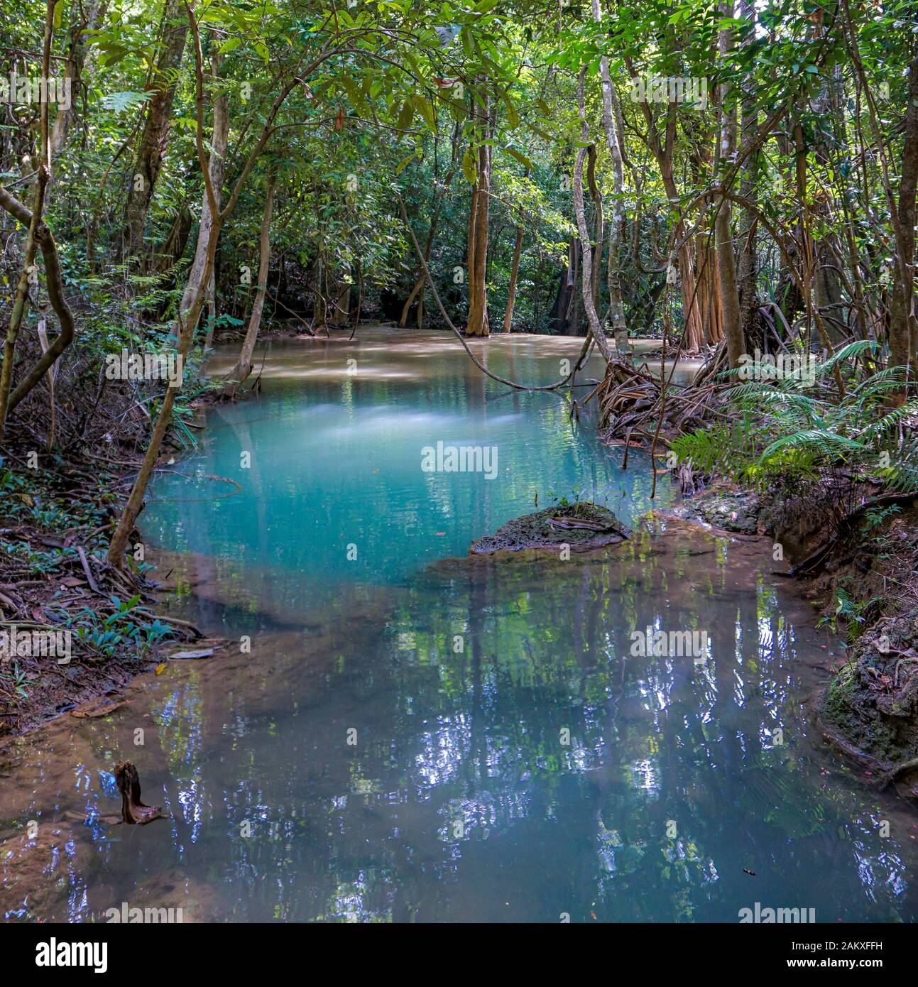 The clean waterfall there is an emerald green colour caused by ...
