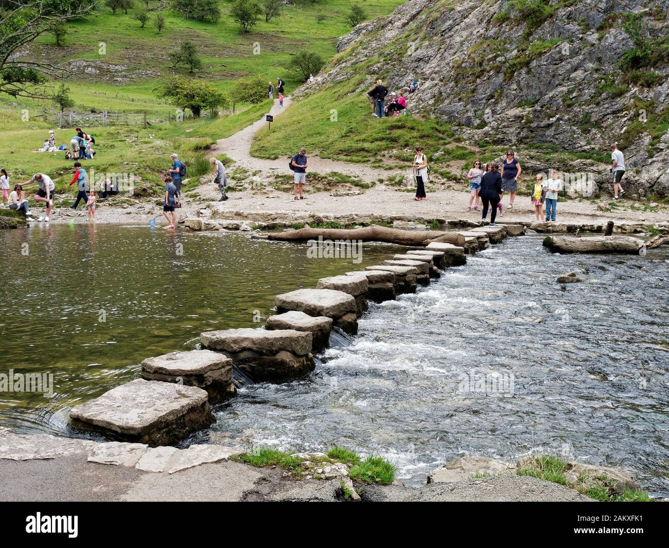 Tourists enjoy the great outdoors by the famous Stepping Stones across ...