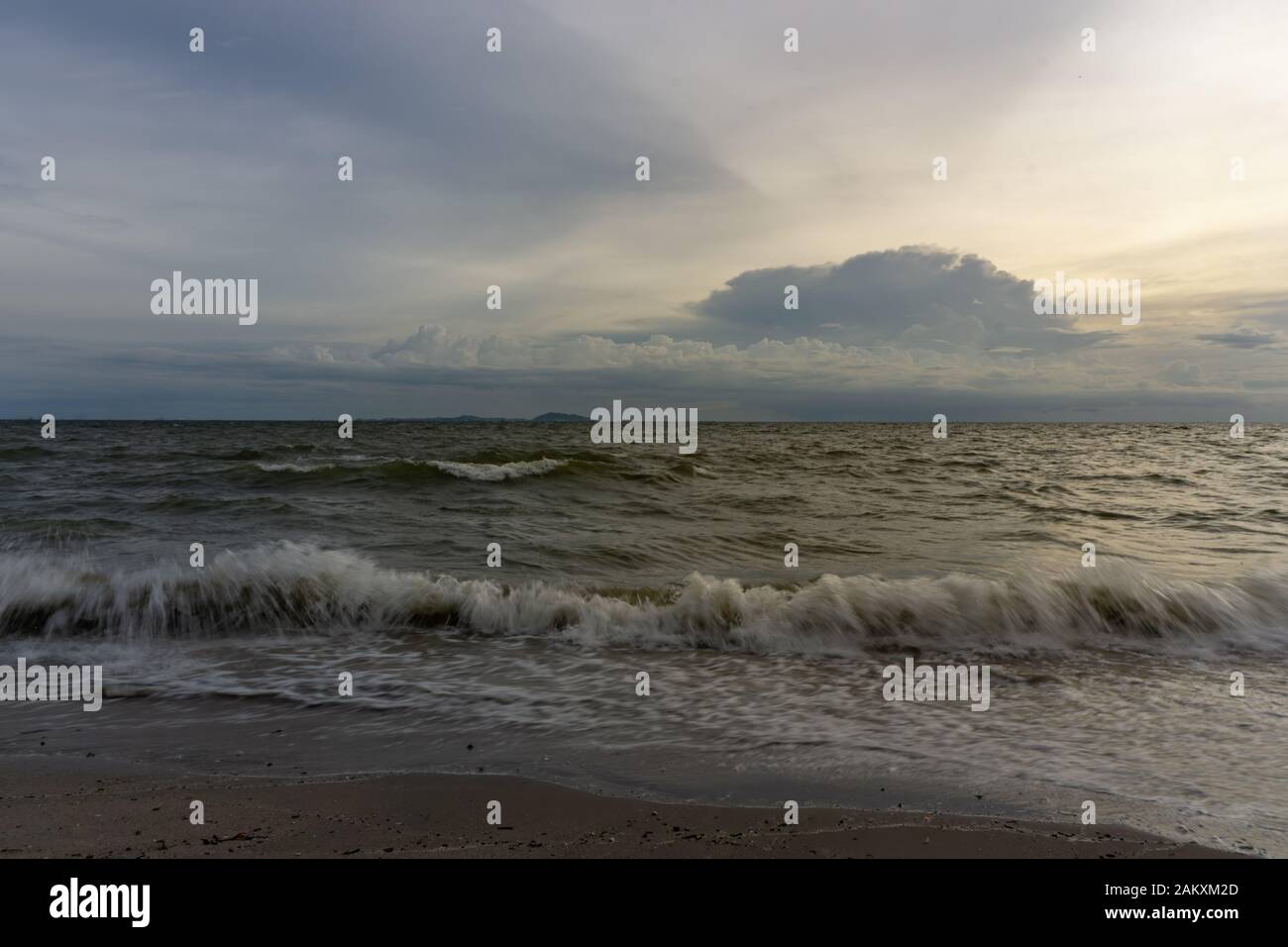 The evening sky has clouds full of sky, the light from the sun reflect ...