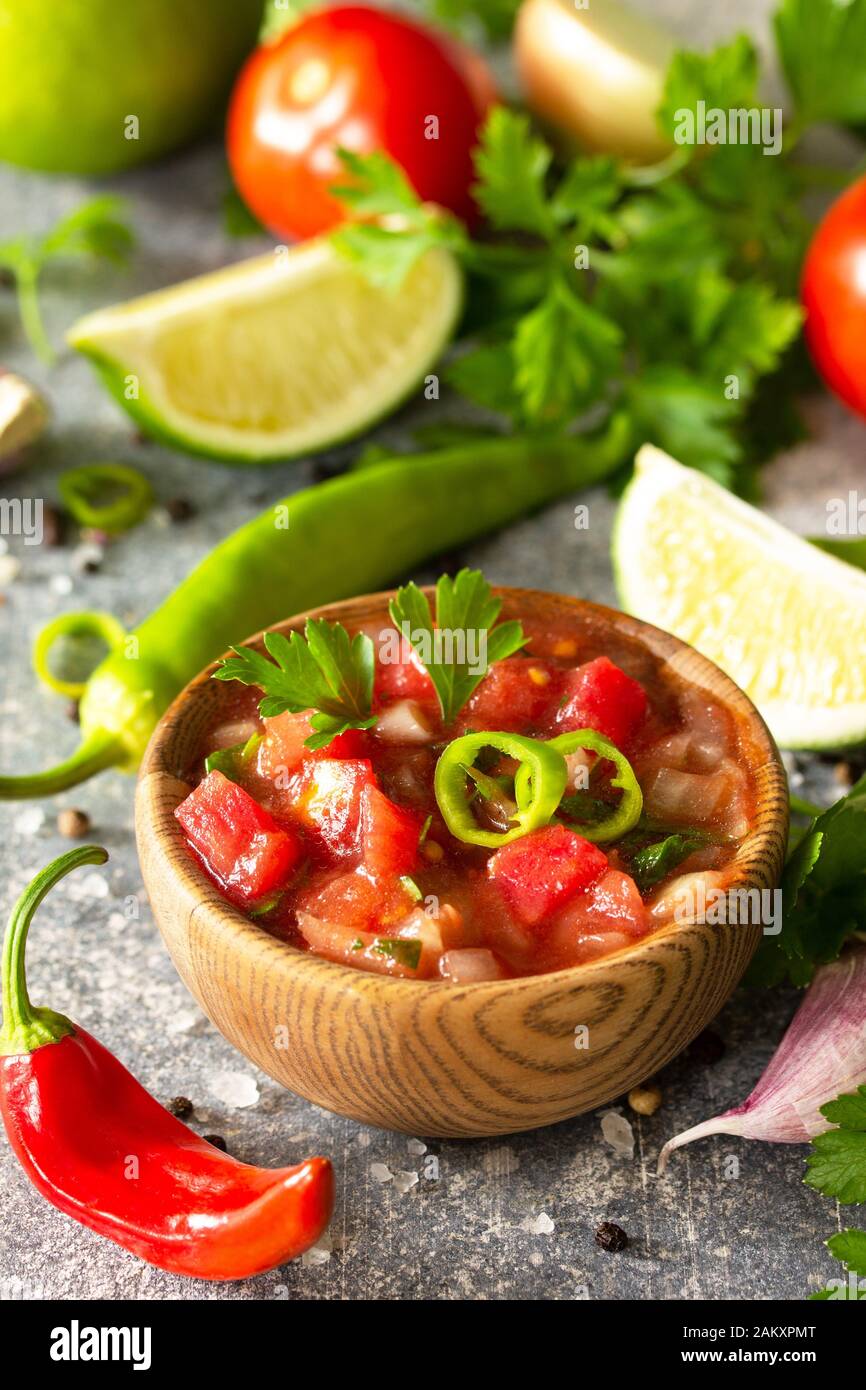 Traditional Latin American mexican salsa sauce with ingredients on a ...