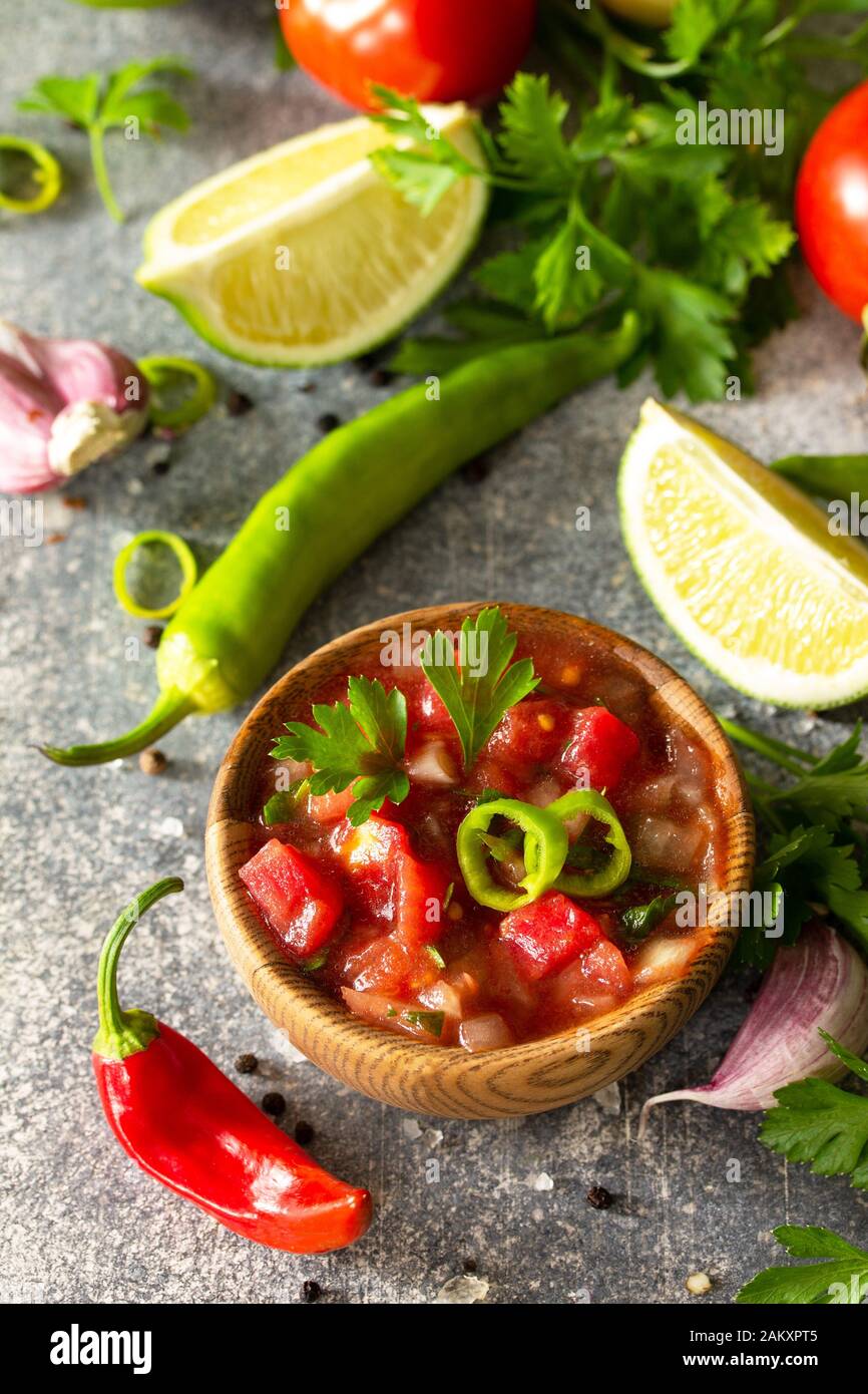 Traditional Latin American mexican salsa sauce with ingredients on a ...