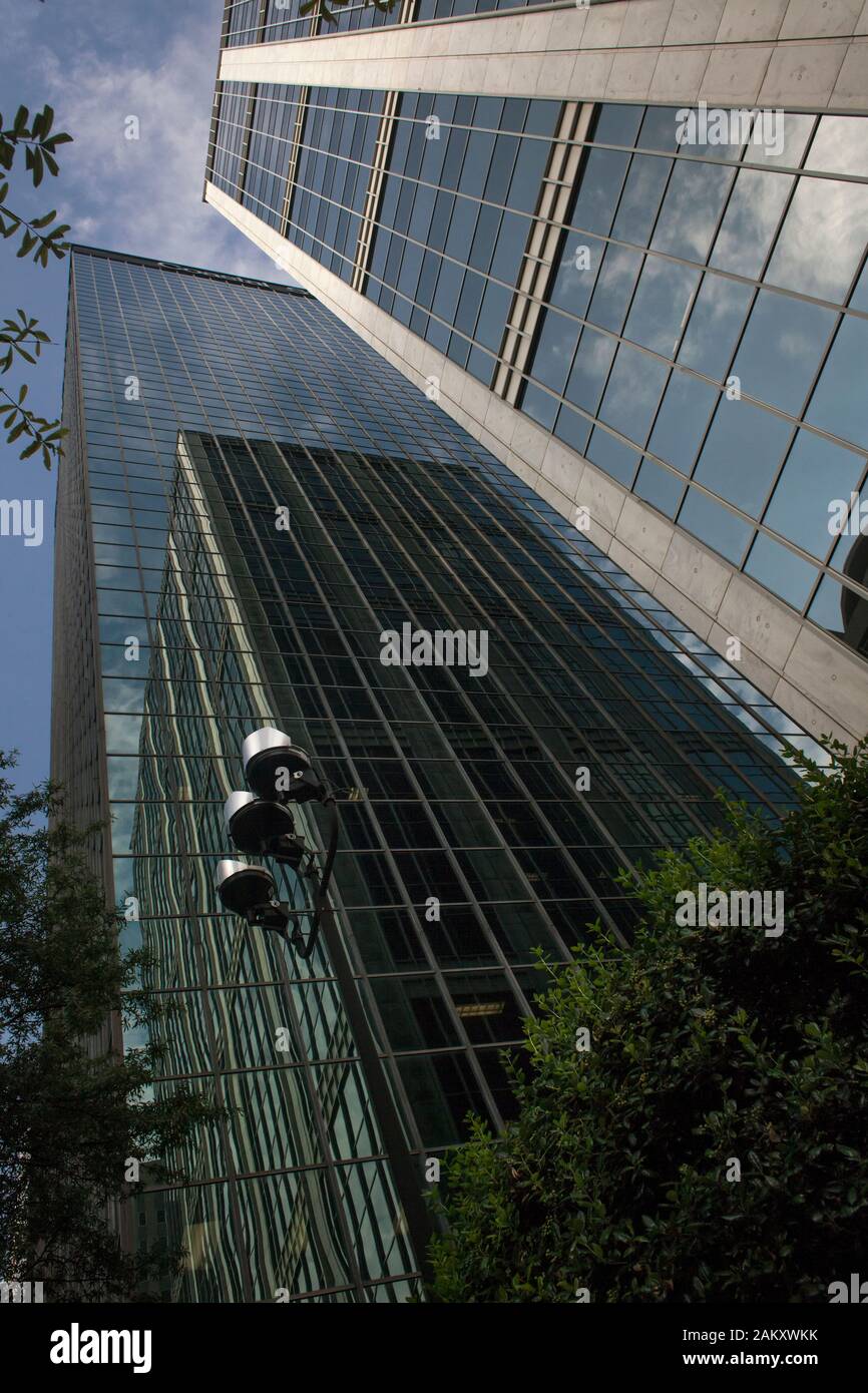 Low angle vertical shot of two glass skyscrapers in Peachtree St ...