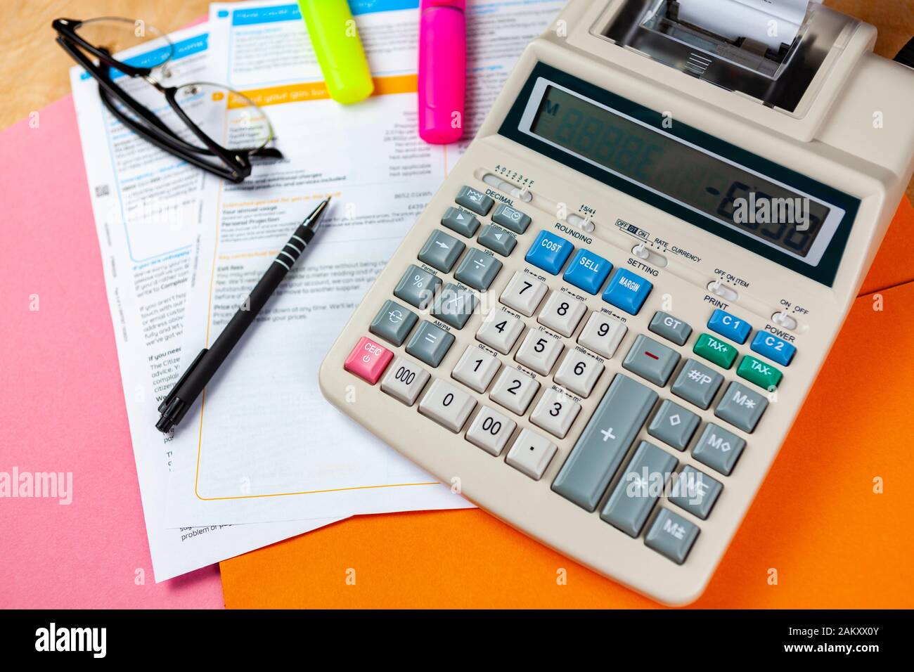 Balance sheet and calculator hi-res stock photography and images - Alamy