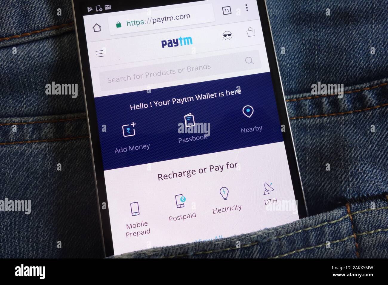 Paytm website displayed on smartphone hidden in jeans pocket Stock ...