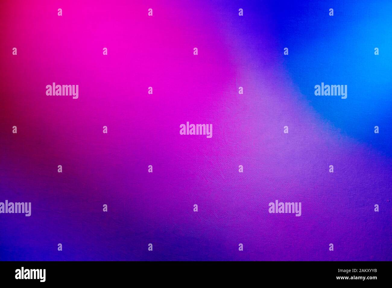 On blurred blue background blurred pink spot Stock Photo - Alamy