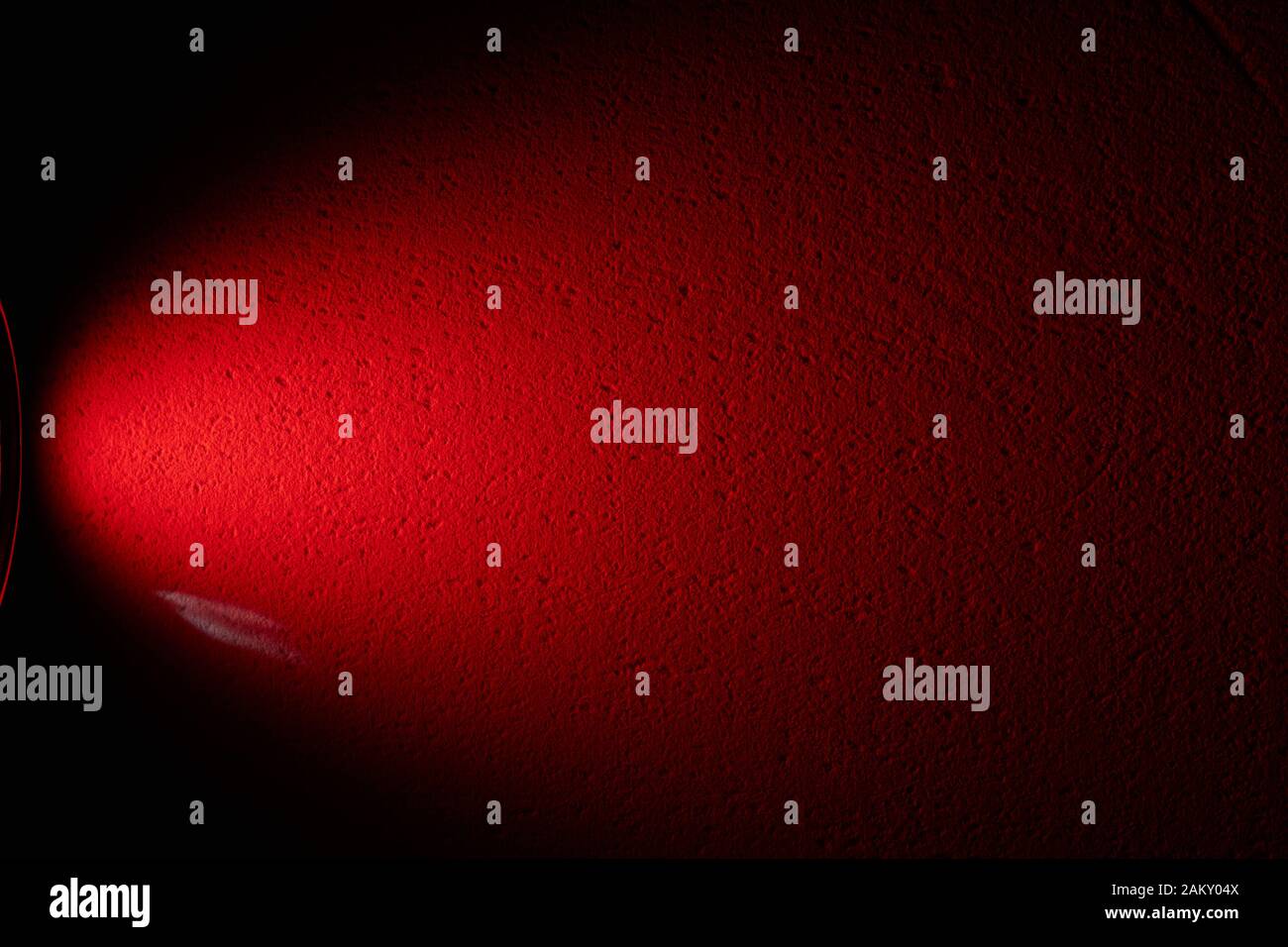Red beam on a black background Stock Photo - Alamy