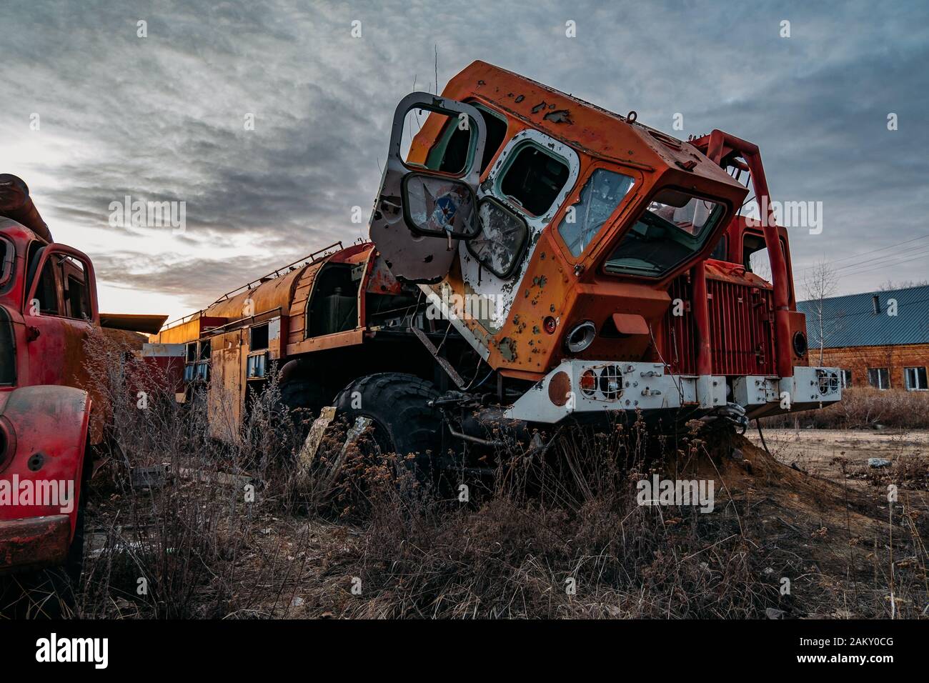 Old rusty broken abandoned Soviet fire truck on evening sunset Stock ...