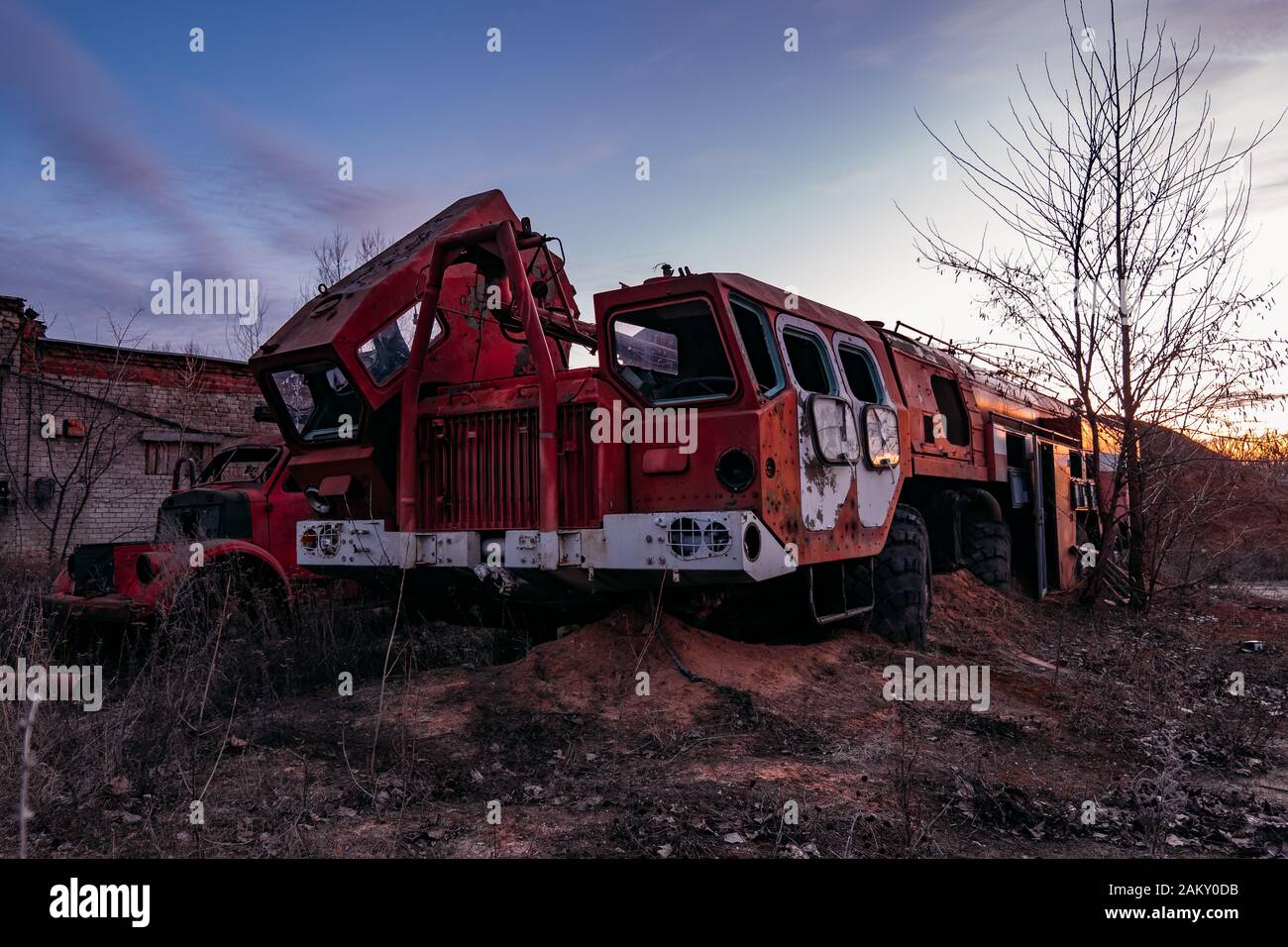 Old rusty broken abandoned Soviet fire truck on evening sunset Stock ...