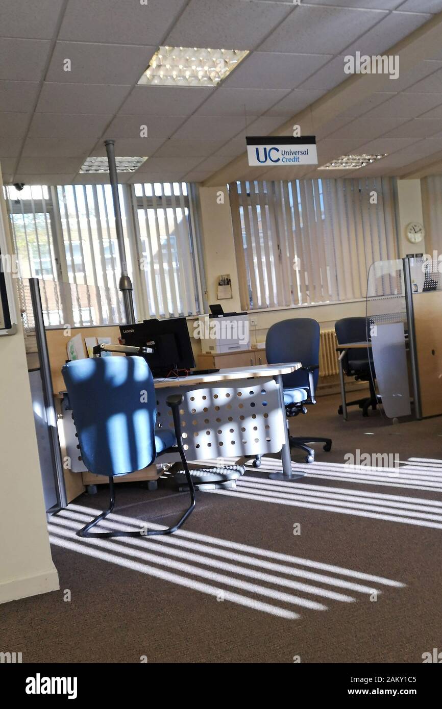 An empty desk at a Job Centre Plus in, Warwickshire, UK. November 2019 ...