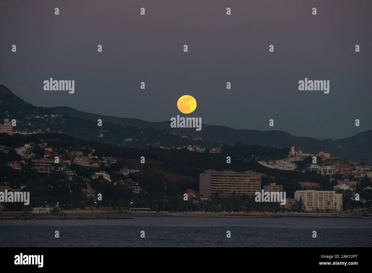 The full moon (known as in this month as 'Wolf moon') rises over the ...