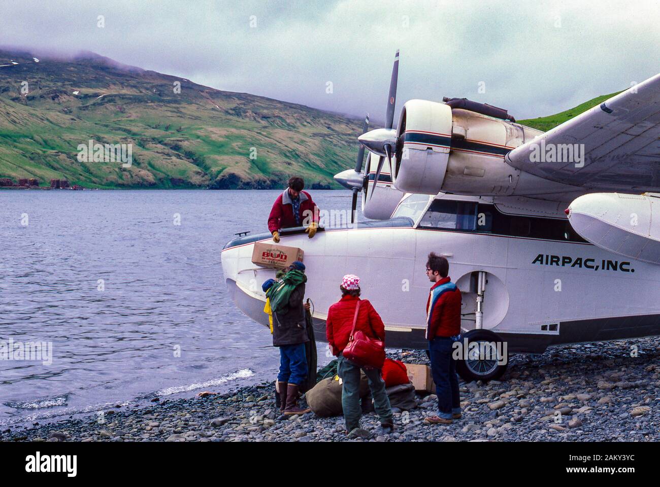 Grumman Widgeon amphibious aircraft, unloading supplie s on Akutan ...