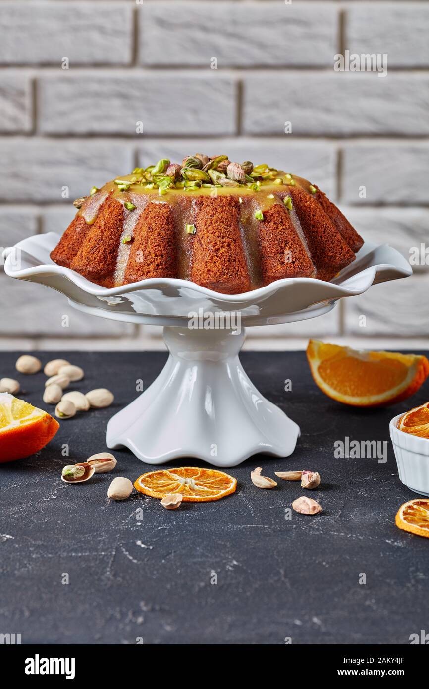 pumpkin carrot sponge cake with orange glaze, sprinkled with pistachios ...