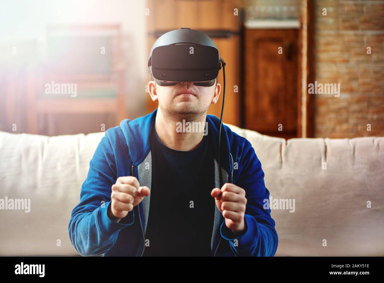 Young man wearing future technology VR glasses Stock Photo - Alamy