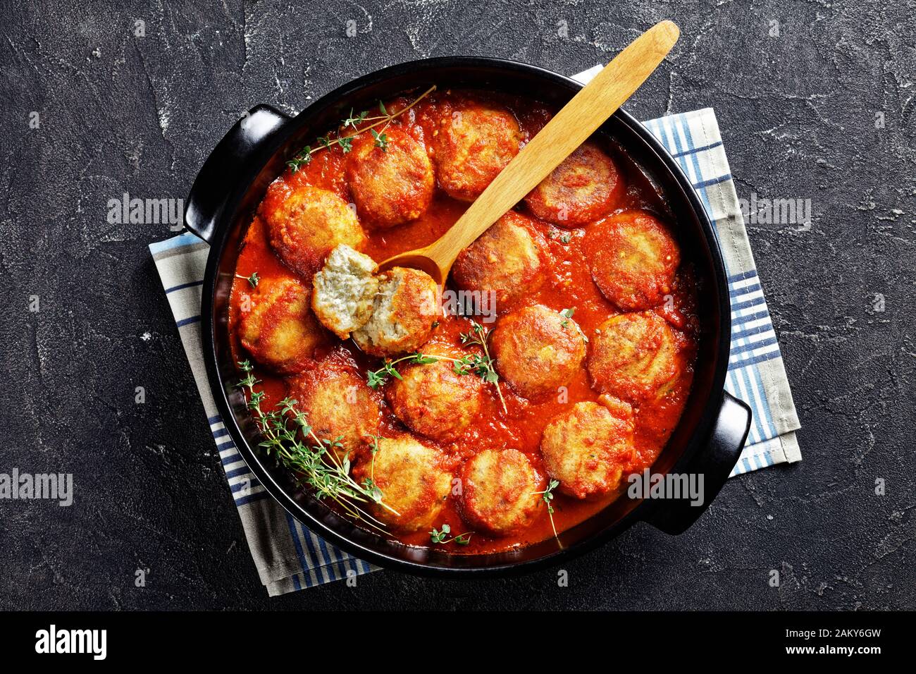 close-up of Boulettes de Poisson, Fried Fish Balls in Tomato Sauce in a ...