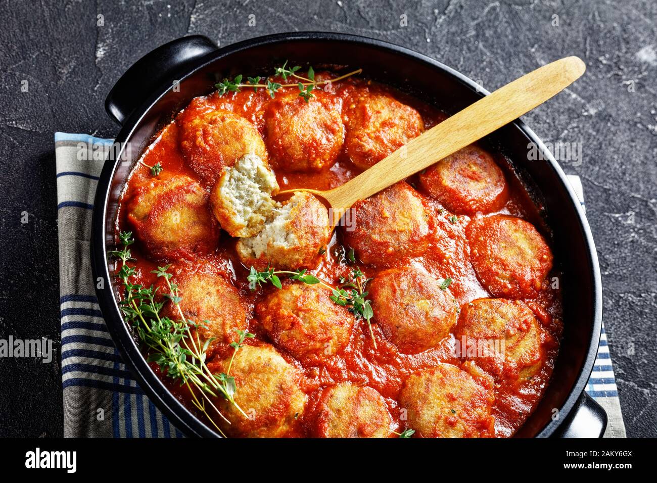close-up of Boulettes de Poisson, Fried Fish Balls in Tomato Sauce in a ...