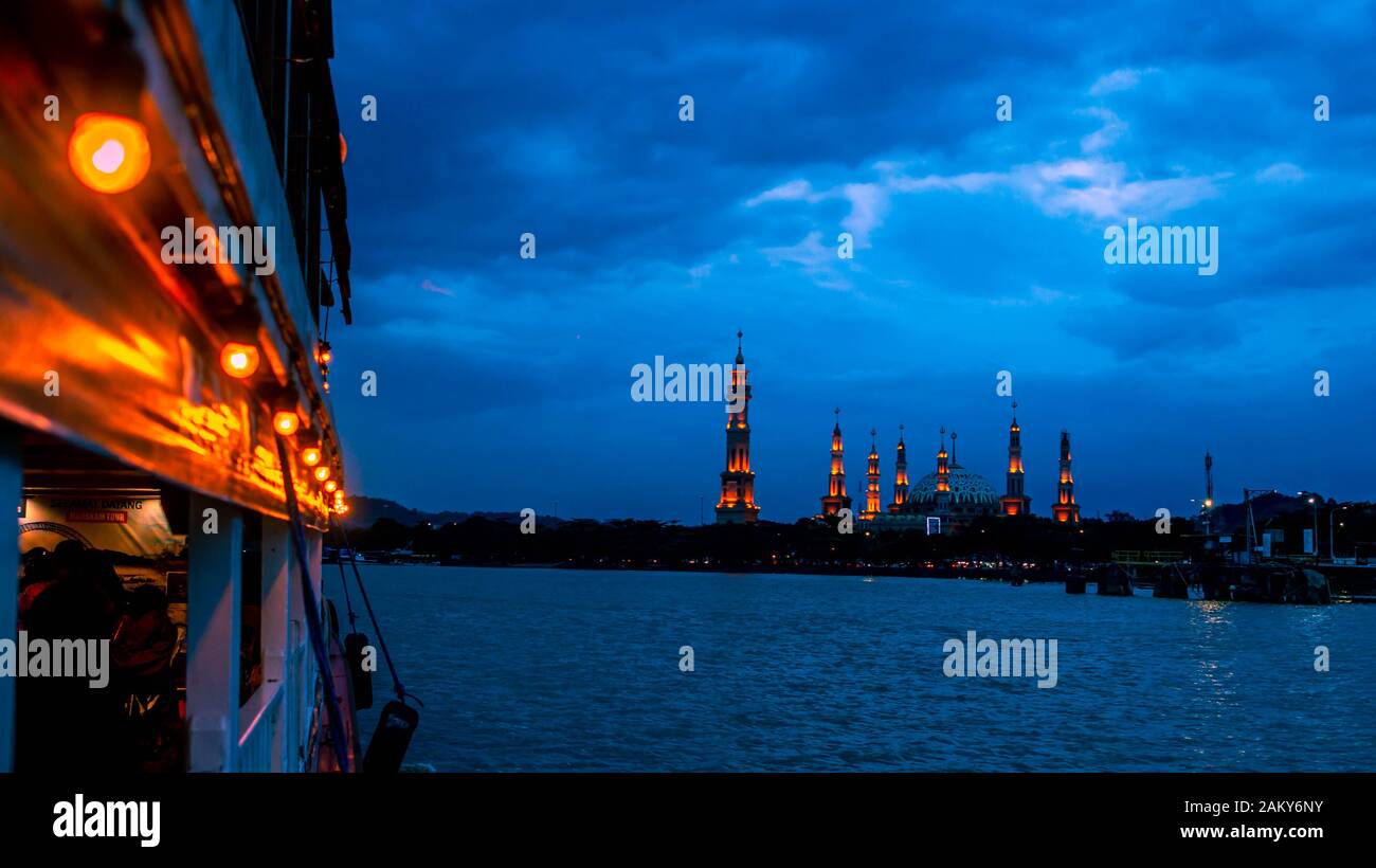 Samarinda Islamic Center seen from the boat at night. Mahakam Riverbank ...