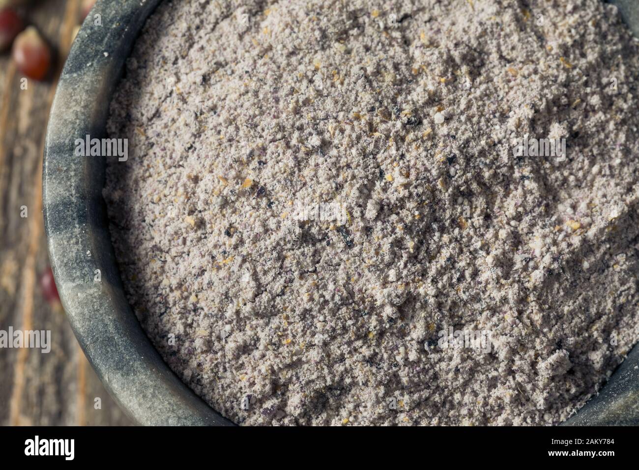 Raw Blue Organic Cornmeal Flour in a Bowl Stock Photo - Alamy