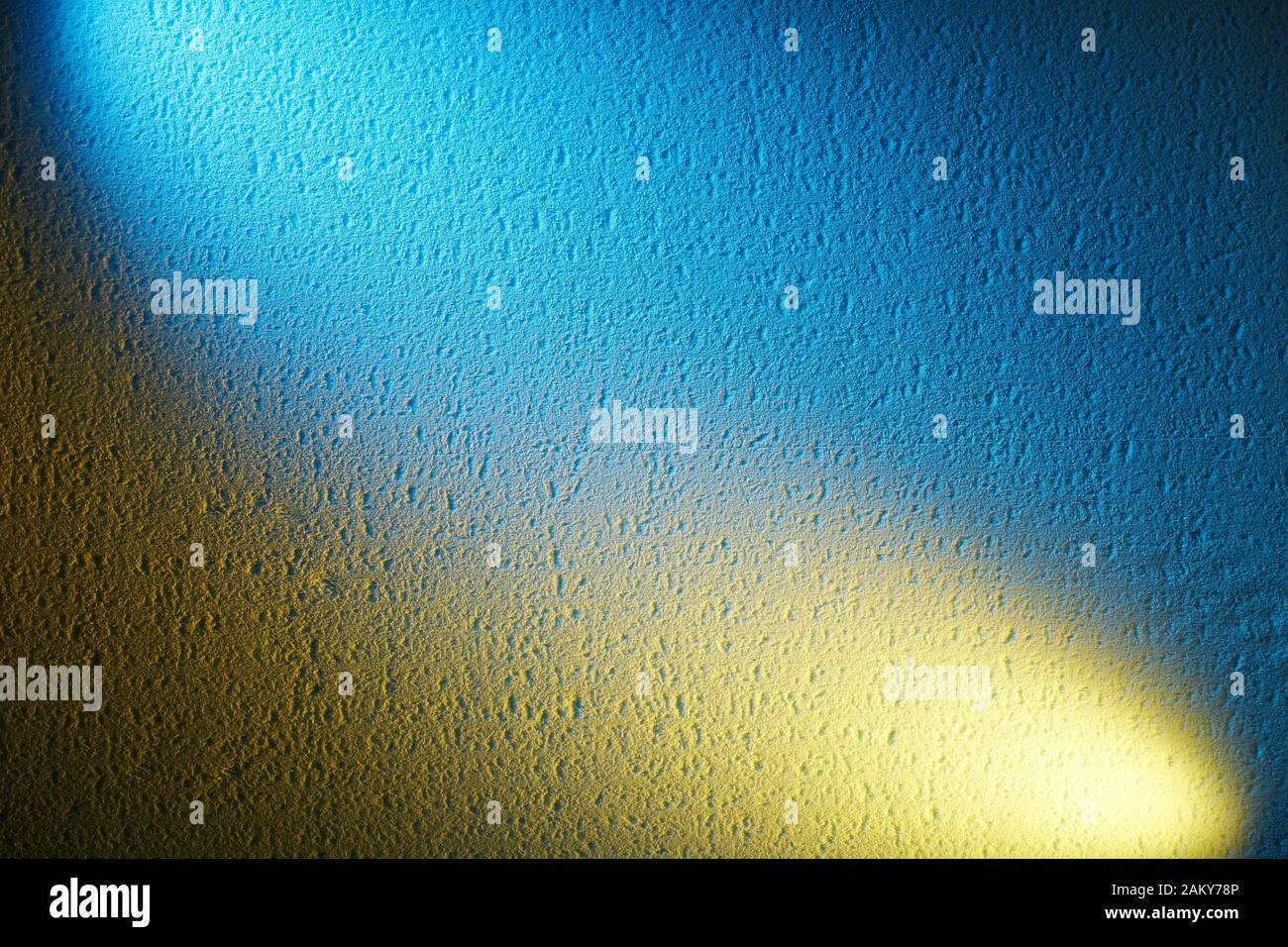 Light yellow and blue lights on a textural background Stock Photo - Alamy