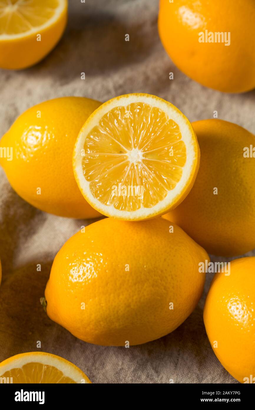 Raw Yellow Organic Meyer Lemons in a Bunch Stock Photo - Alamy