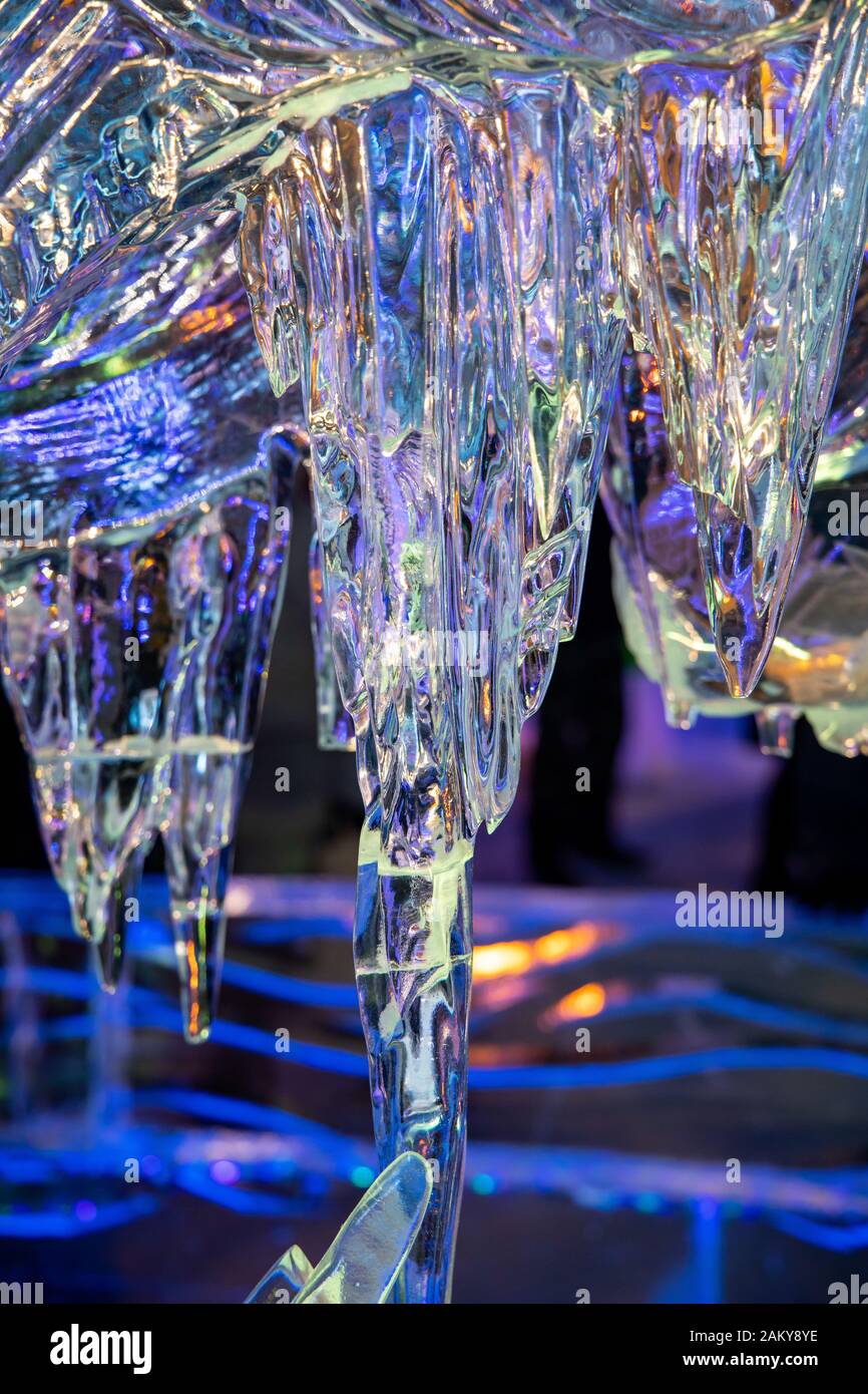Background with transparent multicolored ice Stock Photo - Alamy