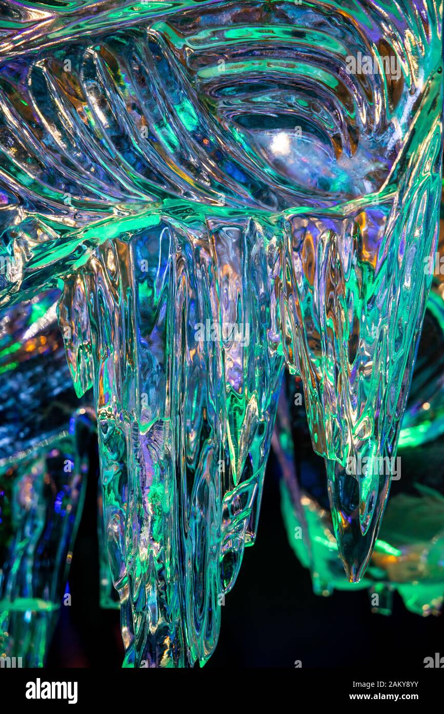 Background with transparent multicolored ice Stock Photo - Alamy