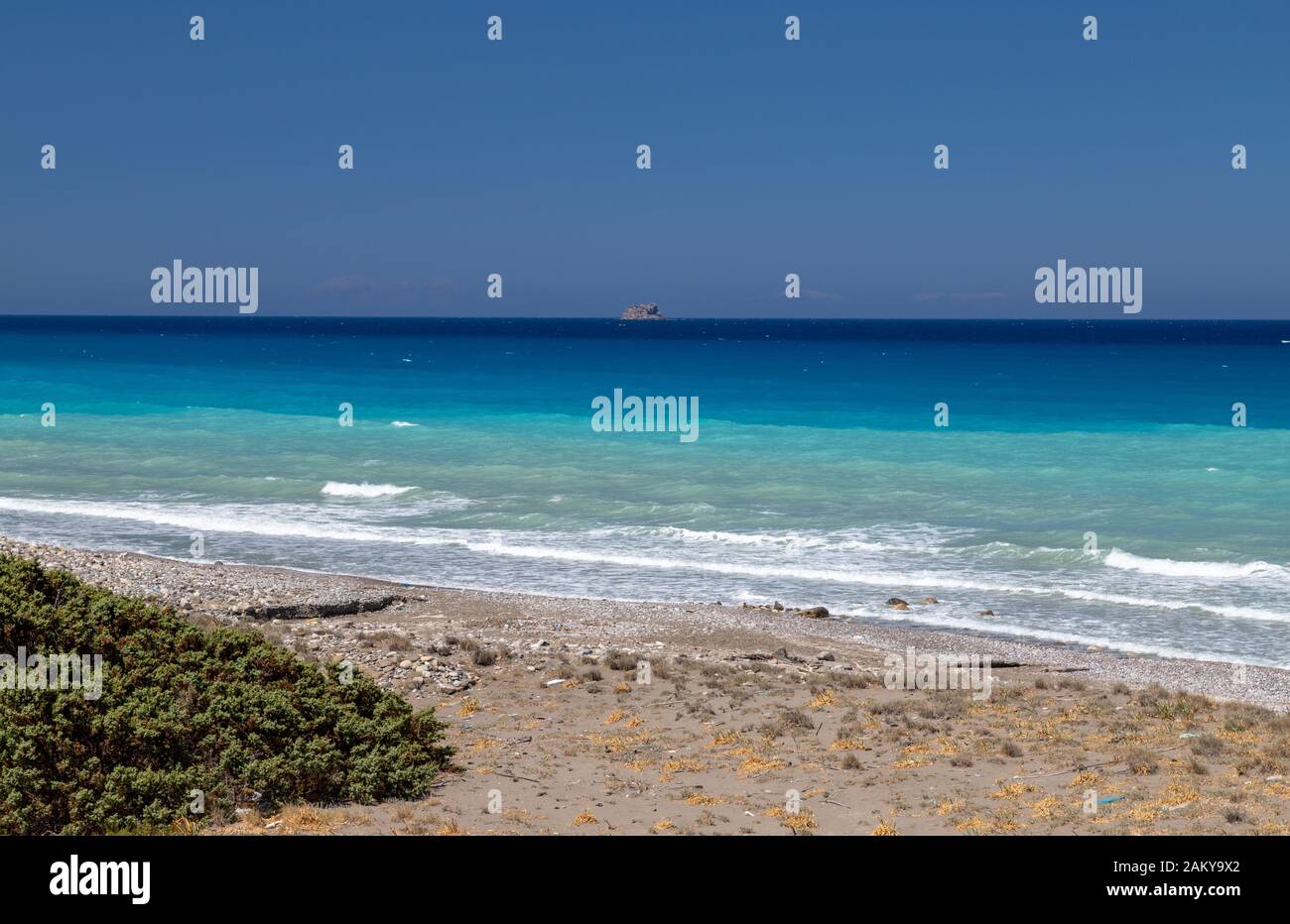 Gravel / pebble beach at the southwest coast of Rhodes island near ...