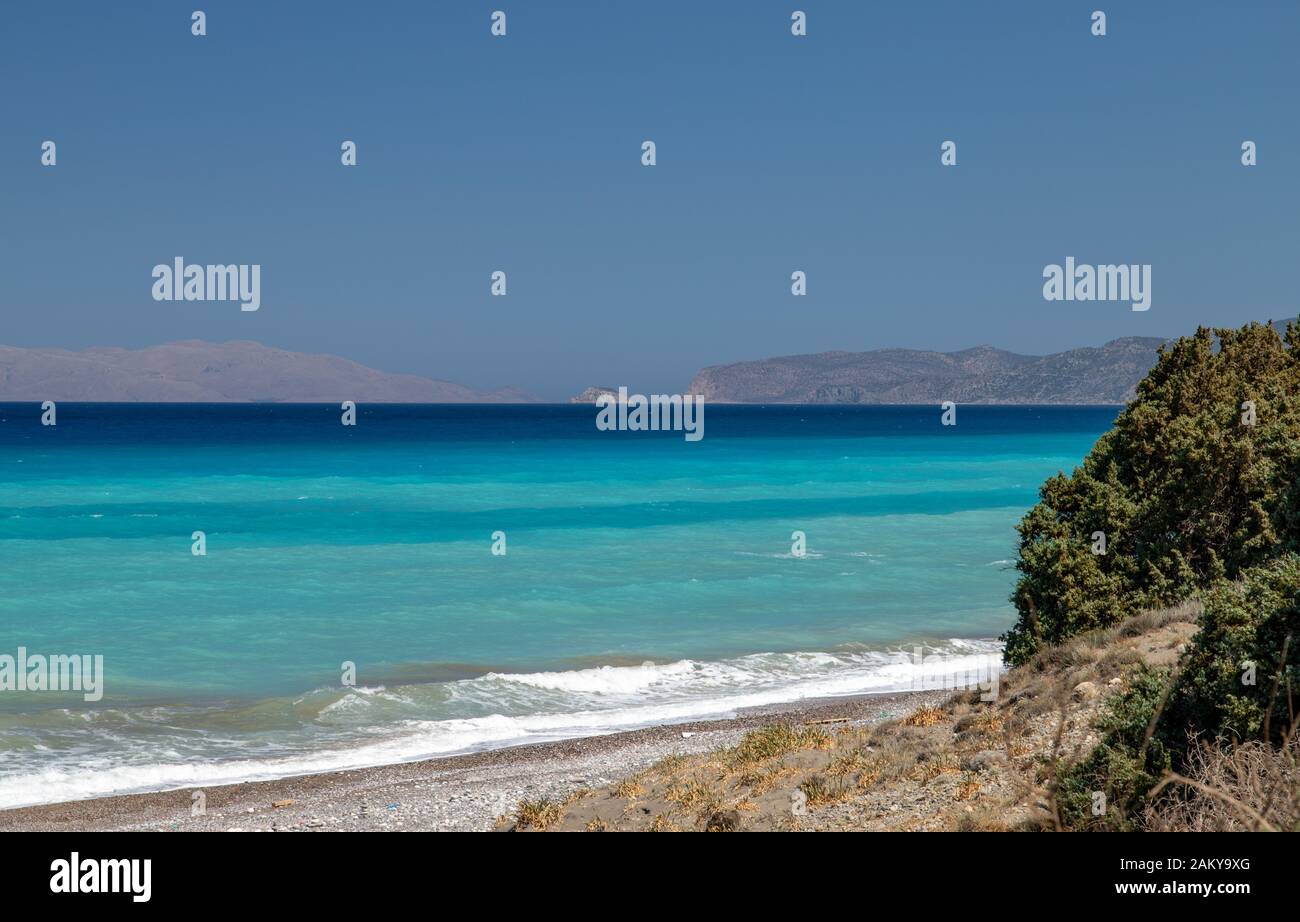 Gravel / pebble beach at the southwest coast of Rhodes island near ...
