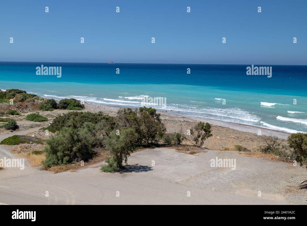 Gravel / pebble beach at the southwest coast of Rhodes island near ...
