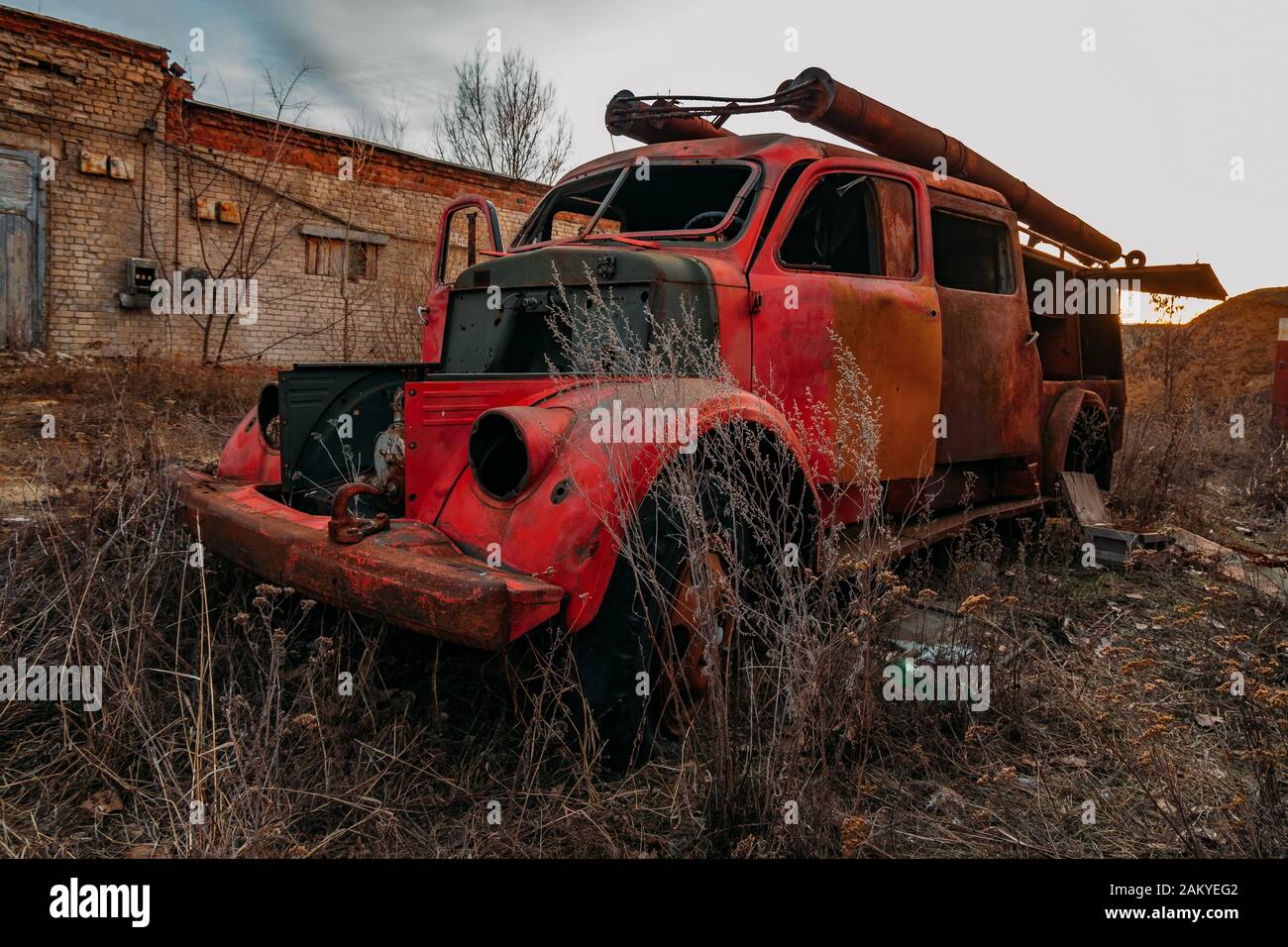 Old rusty broken abandoned Soviet fire truck on evening sunset Stock ...