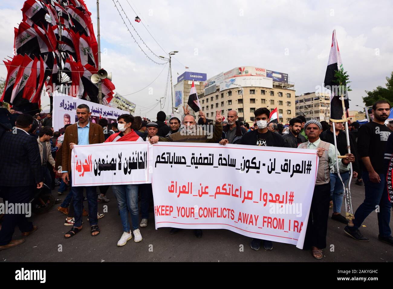 Baghdad, Iraq. 10th Jan, 2020. protesters chant slogans and carry ...