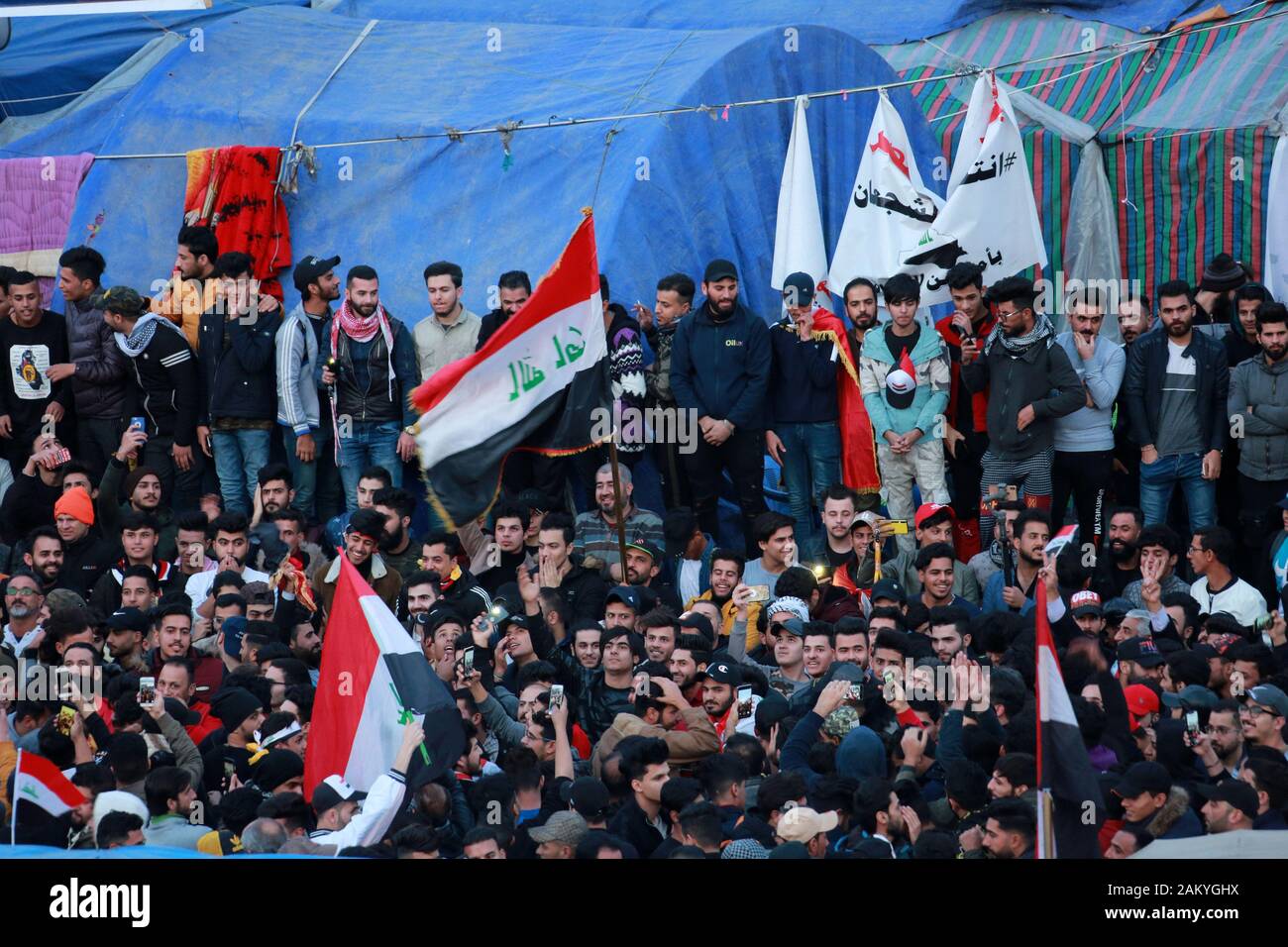 Baghdad, Iraq. 10th Jan, 2020. protesters chant slogans and carry ...