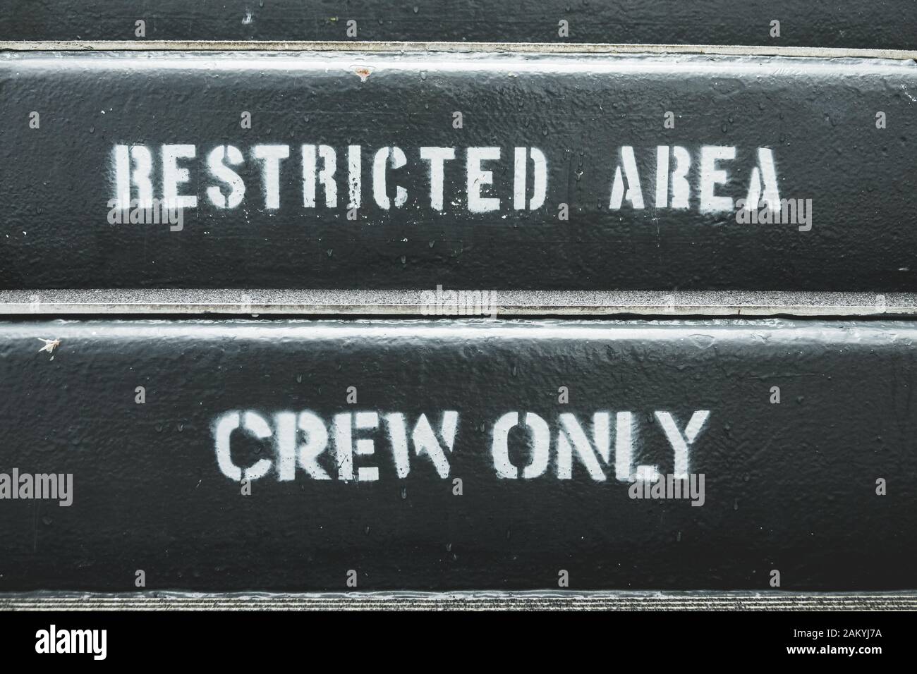 Horizontal image of a restricted area sign, only crew Stock Photo - Alamy