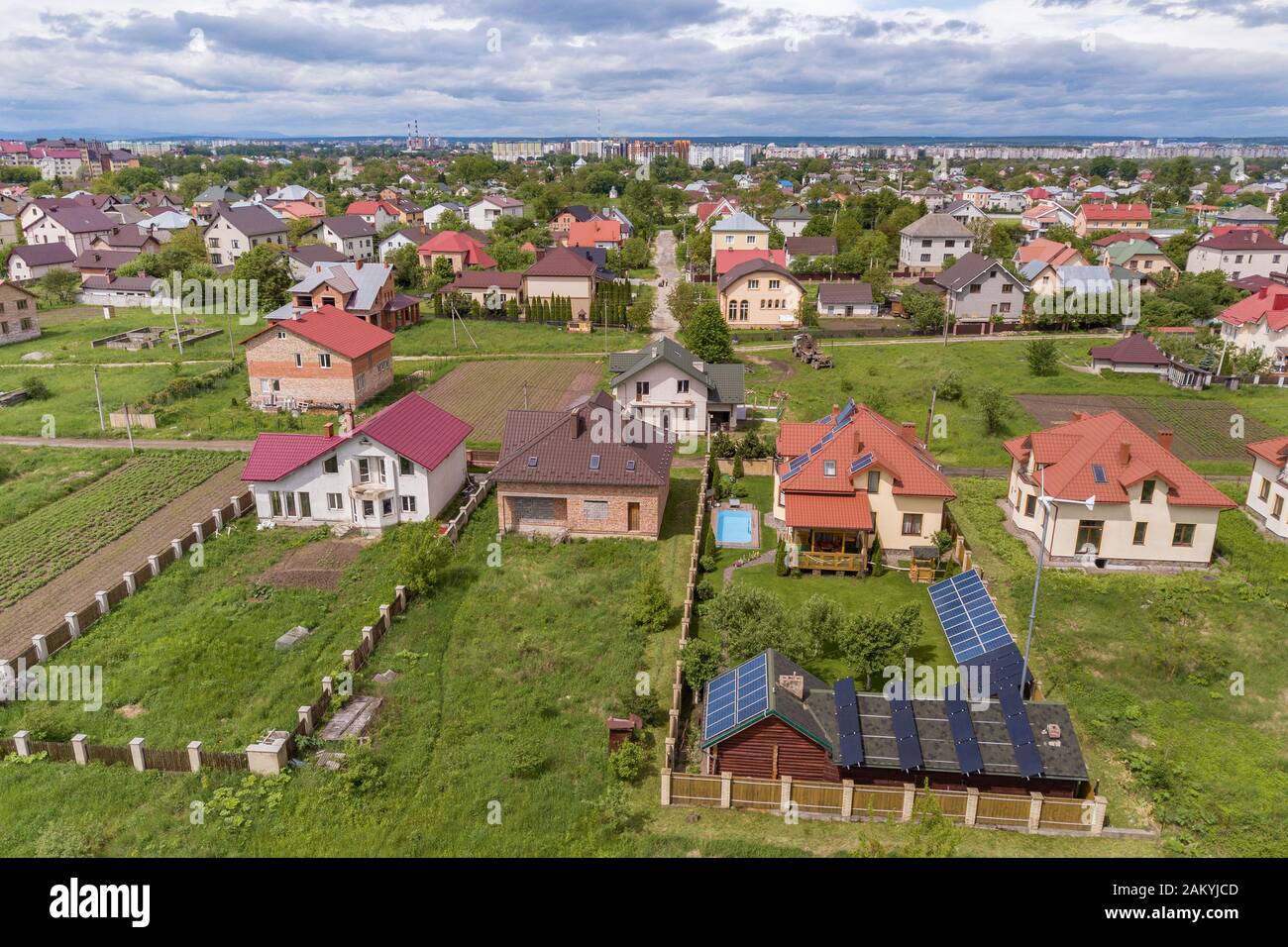 Aerial view of a new autonomous house with solar panels and water ...