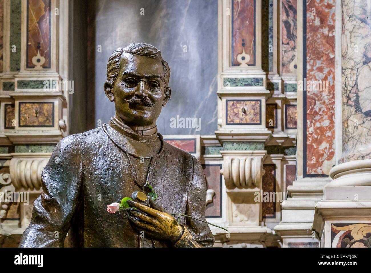 NAPLES, ITALY - JANUARY 3, 2020: light is enlightening the statue of ...