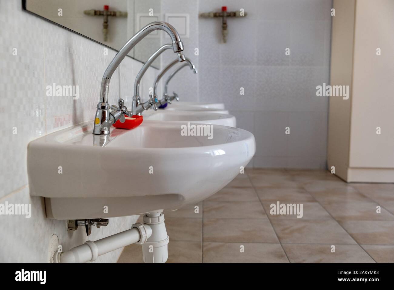 White ceramic handbasin chrome tap hi-res stock photography and images ...