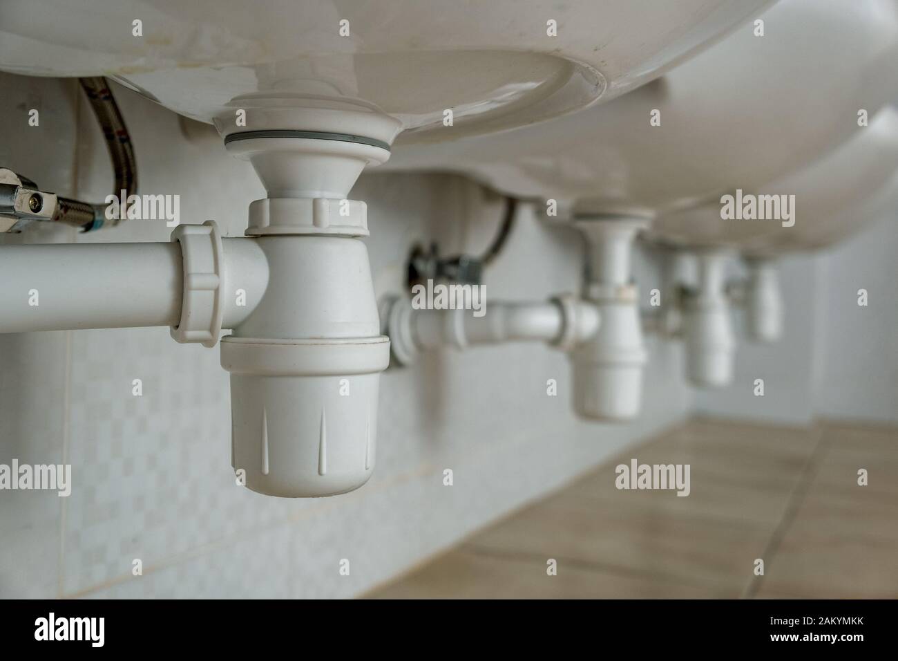 White plastic drainpipe hi-res stock photography and images - Alamy