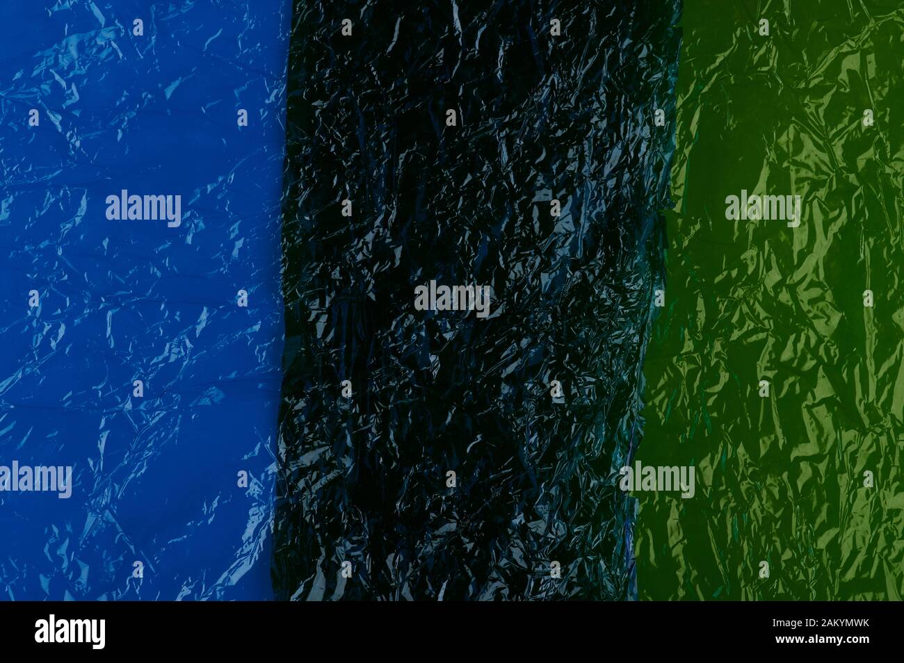 Blue and green plastic bag surface flat view Stock Photo - Alamy
