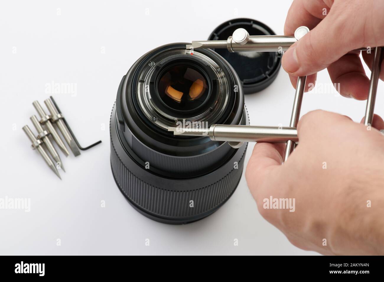 Repair digital lens service theme. Fixing electronic work Stock Photo ...