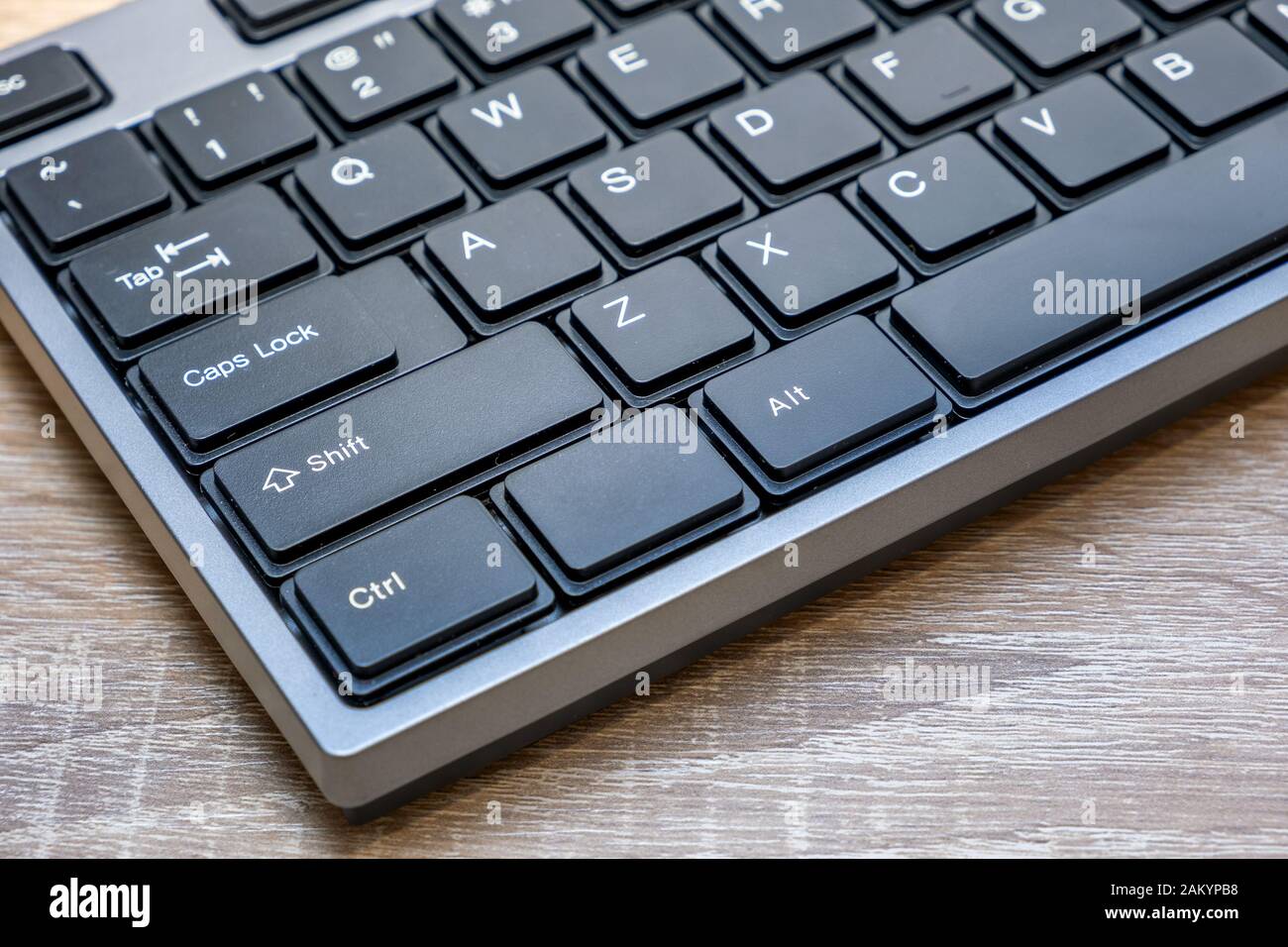 Close up of black keyboard on office desk Stock Photo - Alamy