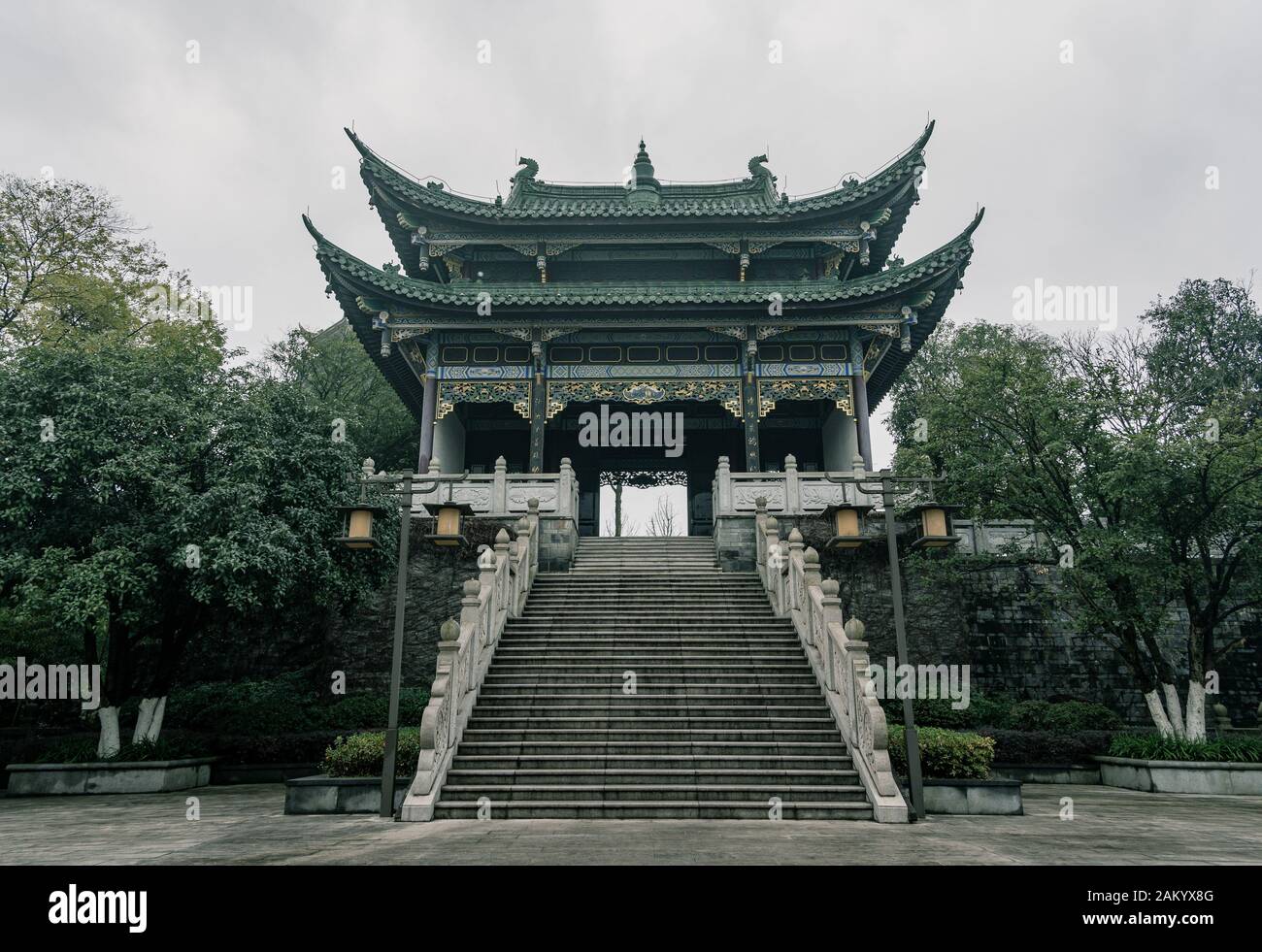Ancient Hong'En Temple front gate with stairs under overcast weather in ...