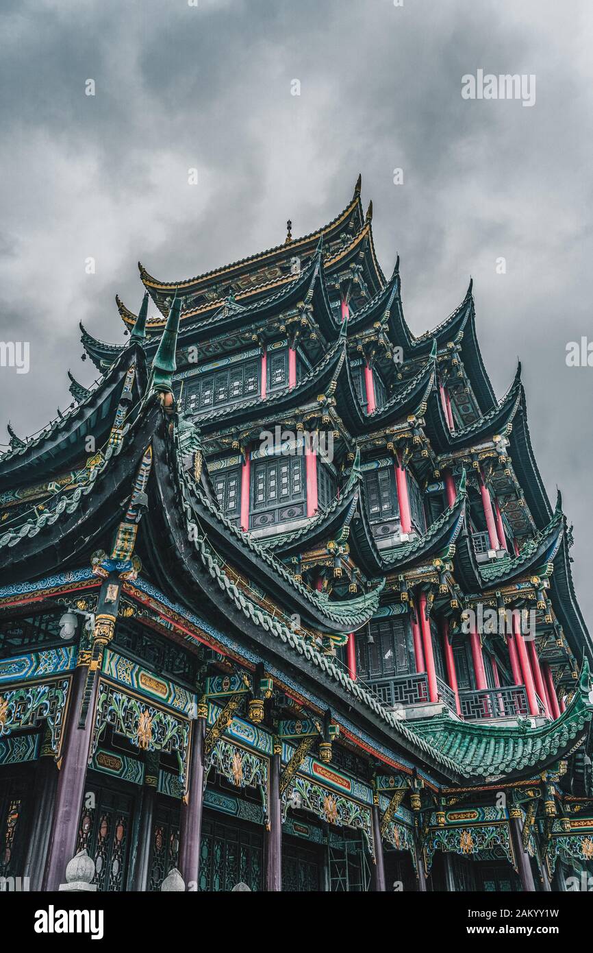 Ancient Hong'en Pagoda tower with green tiled red columns in Chongqing ...