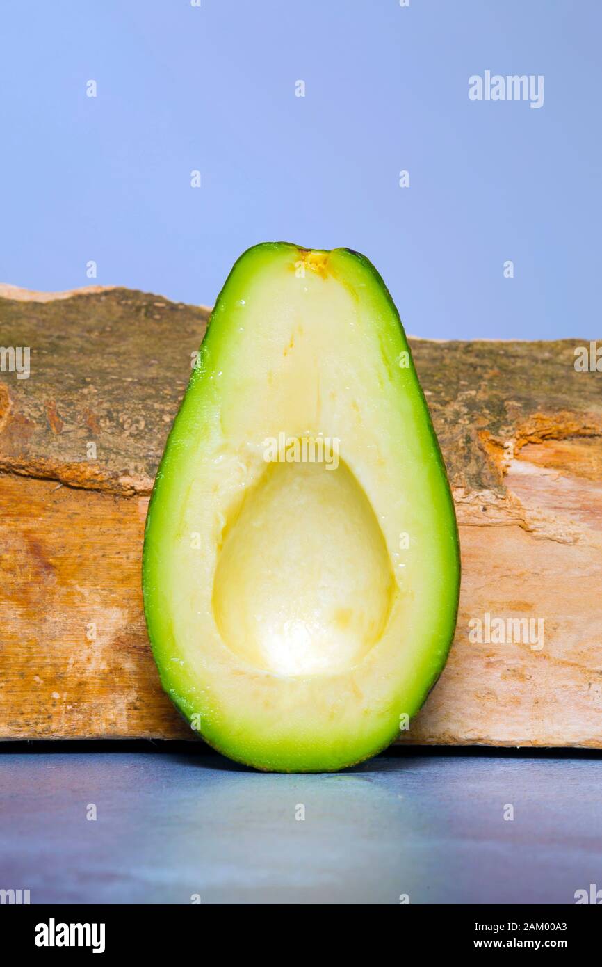 Half and avocado Stock Photo - Alamy