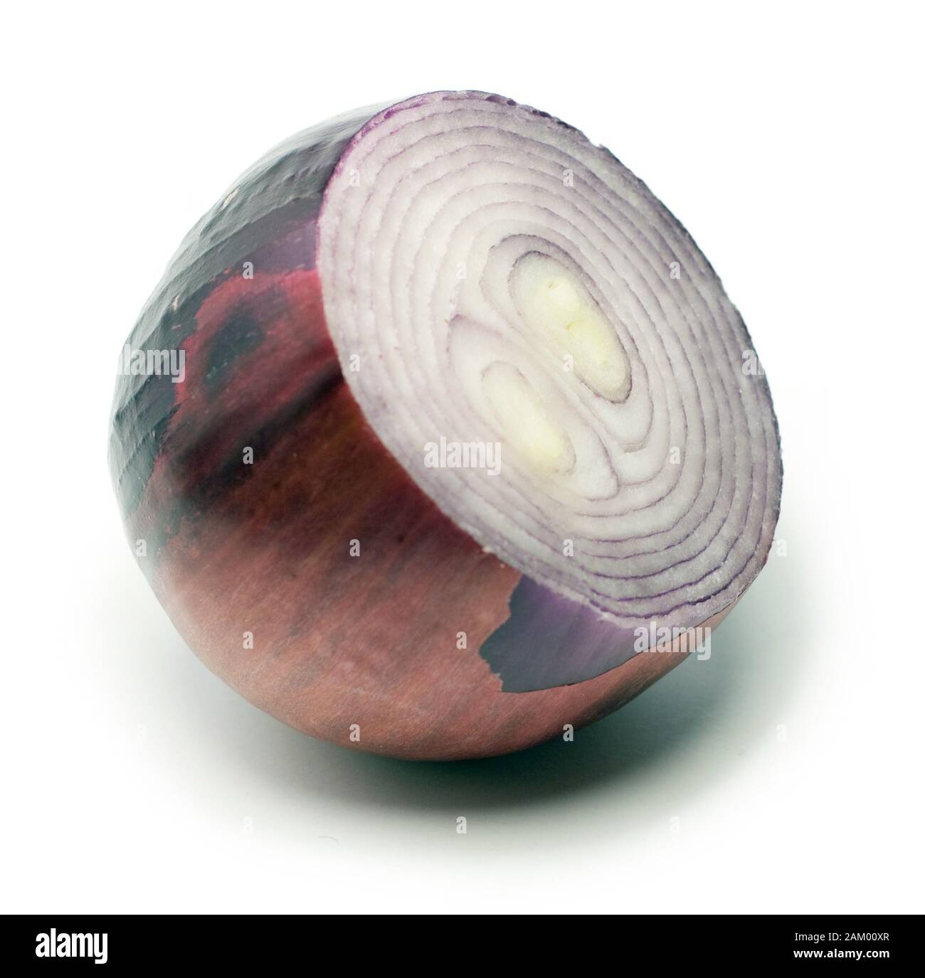 Close up shot of a red onion on white background Stock Photo - Alamy