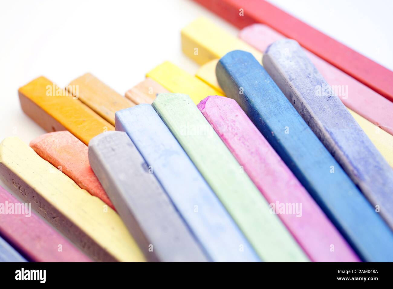 Colourful crayons on white background Stock Photo - Alamy