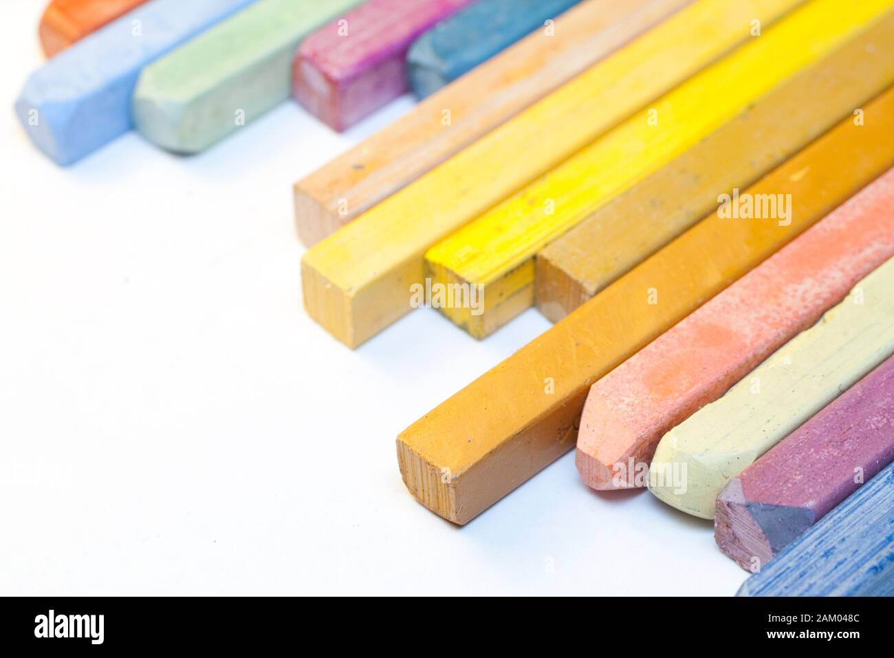 Colourful crayons on white background Stock Photo - Alamy