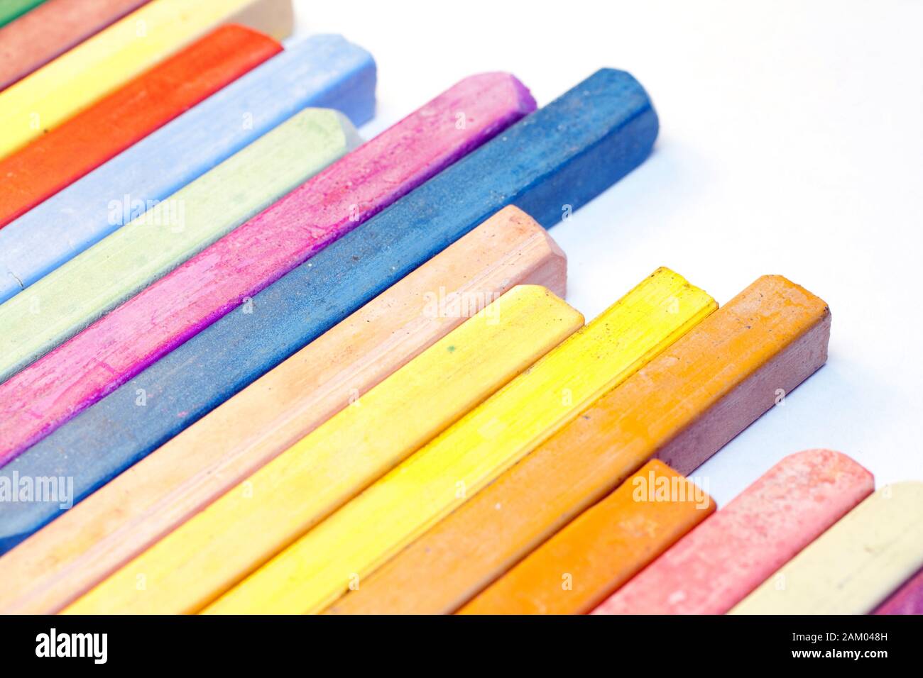 Colourful crayons on white background Stock Photo - Alamy