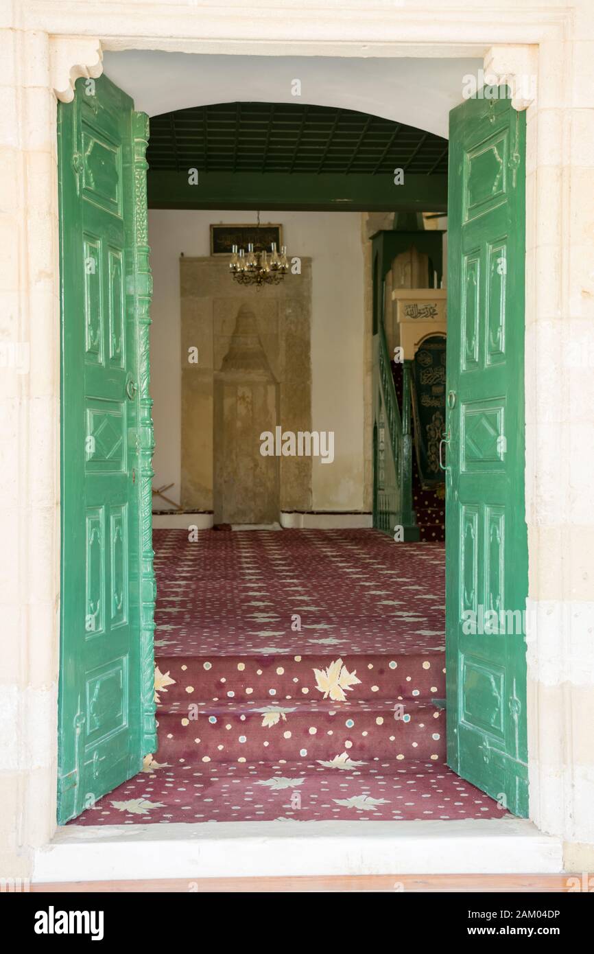 Entrance with green wooden doors in the muslim mosque Stock Photo - Alamy