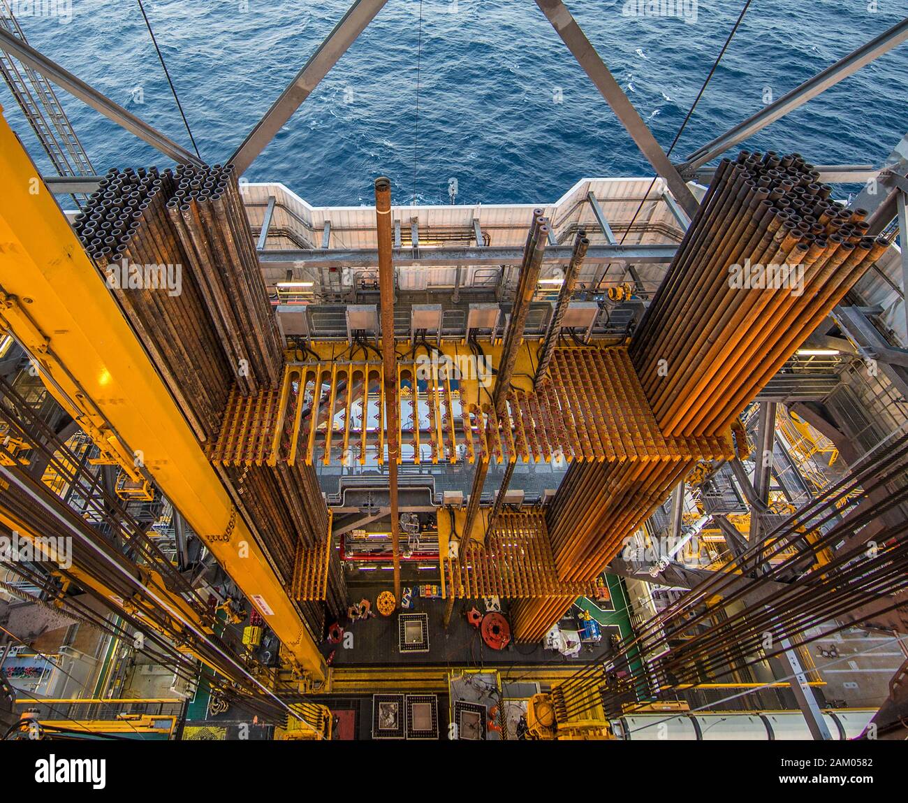 Offshore Drilling during sunset in the Gulf of Mexico Stock Photo - Alamy